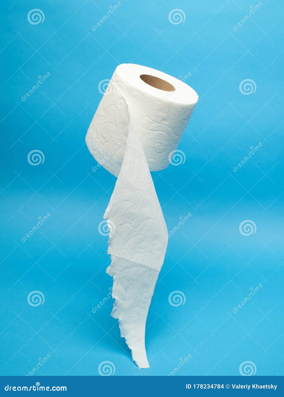 Torn Off White Toilet Paper Roll on Minimalistic Blue Background Stock ...