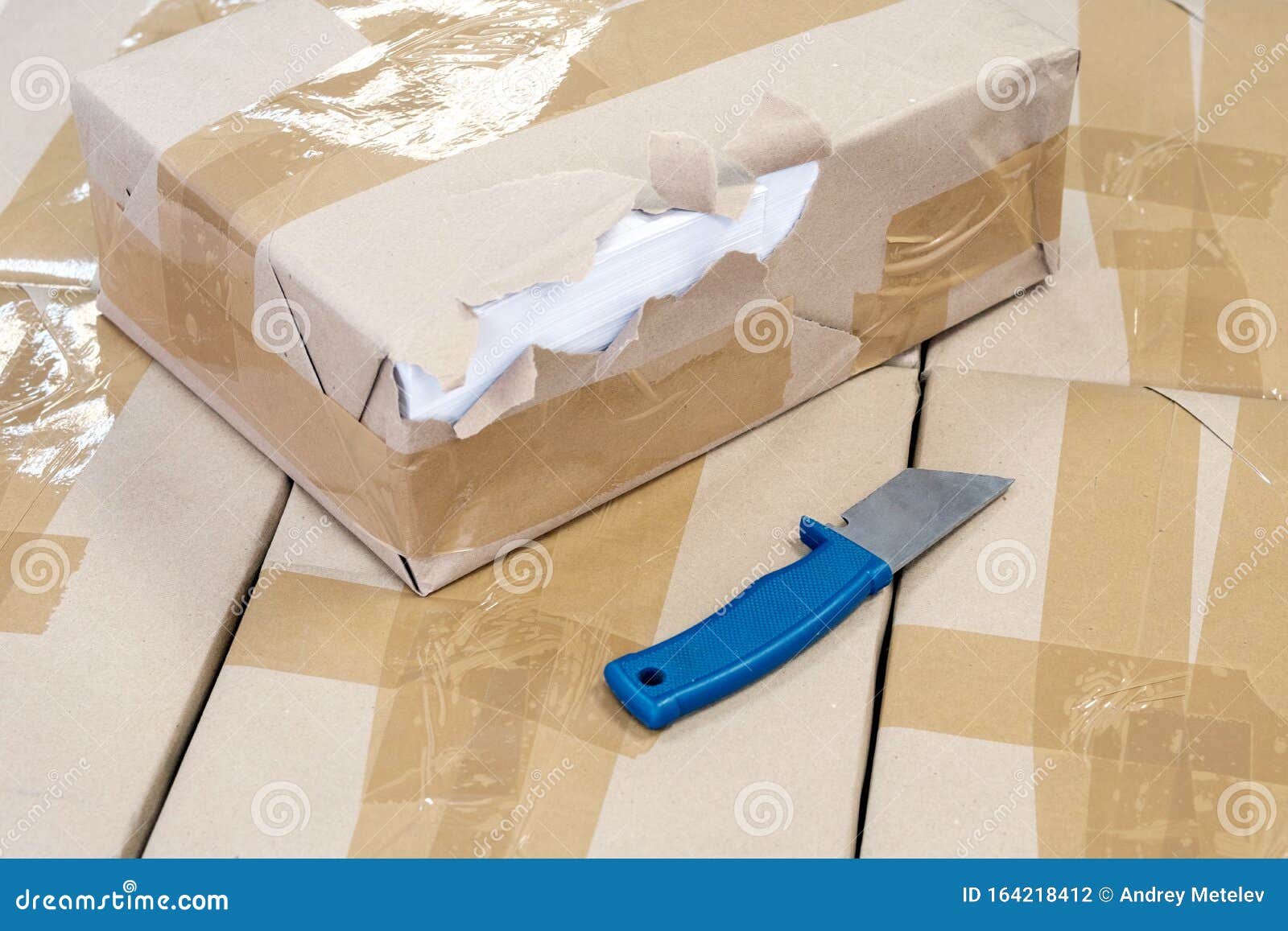 Torn Pack and Knife in the Warehouse Opening and Sorting in the ...