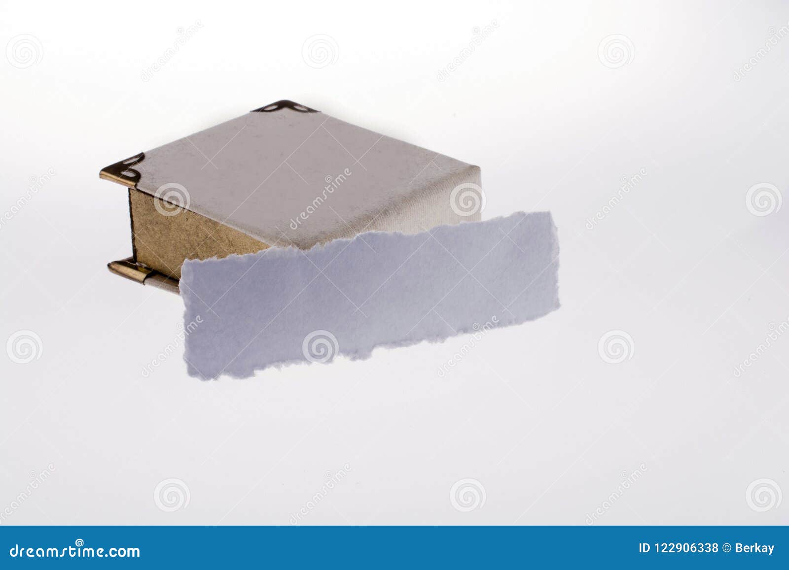 Torn paper and a book stock photo. Image of paper, written - 122906338