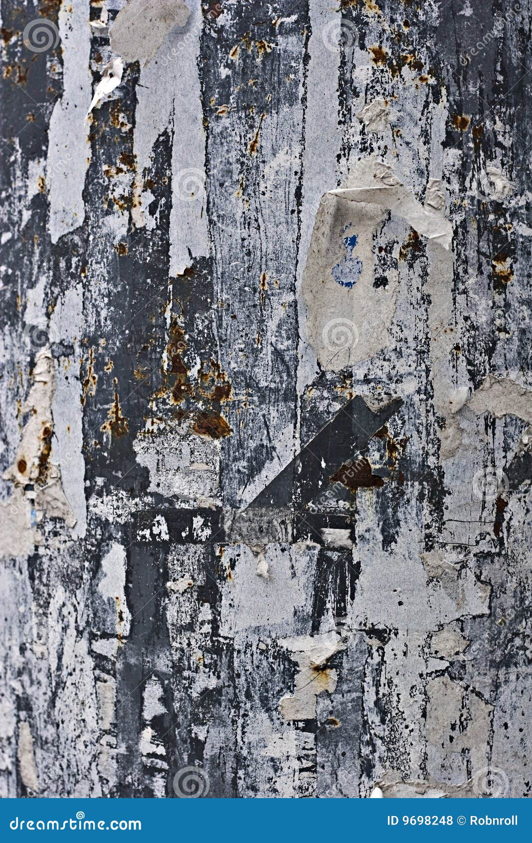 Torn paper on a metal wall stock photo. Image of antique - 9698248