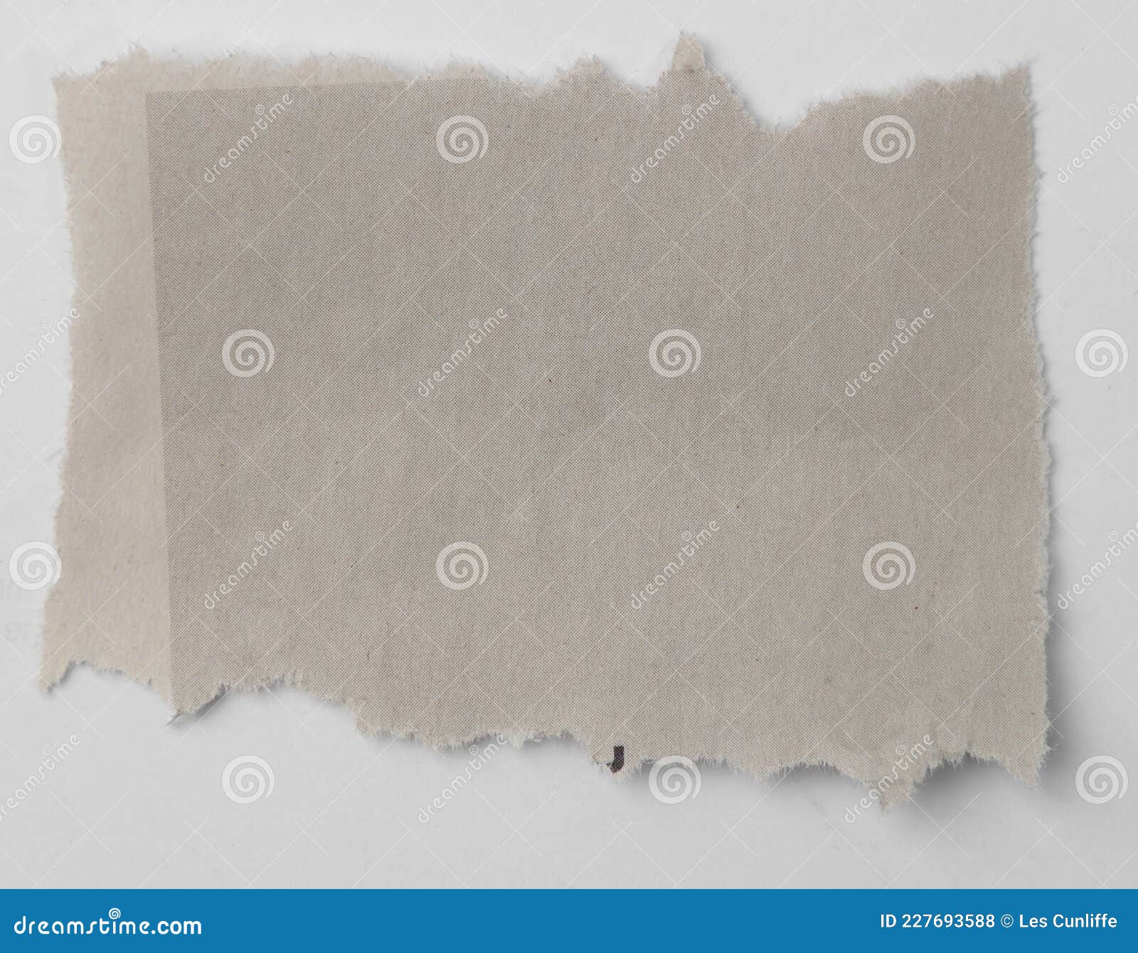 Torn paper piece stock photo. Image of closeup, paper - 227693588