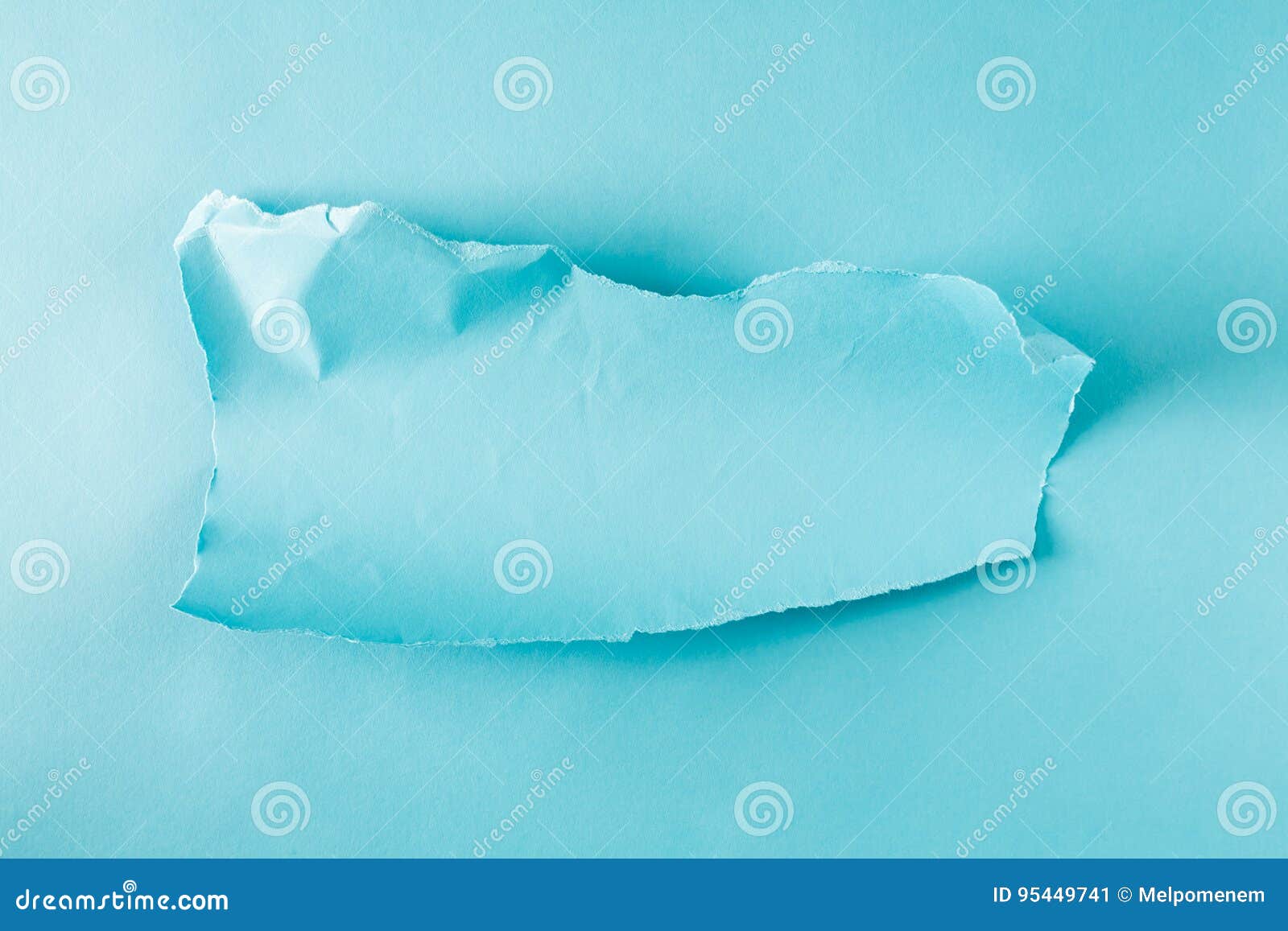 Torn piece of blue paper stock image. Image of curl, overhead - 95449741
