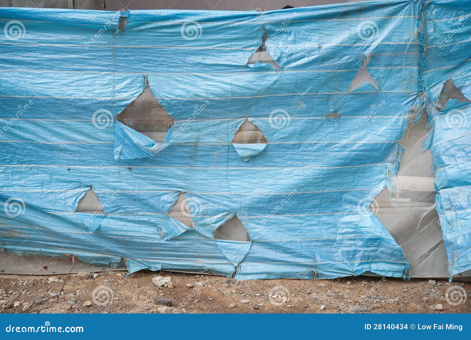 Torn plastic cover stock photo. Image of blue, site, holes - 28140434