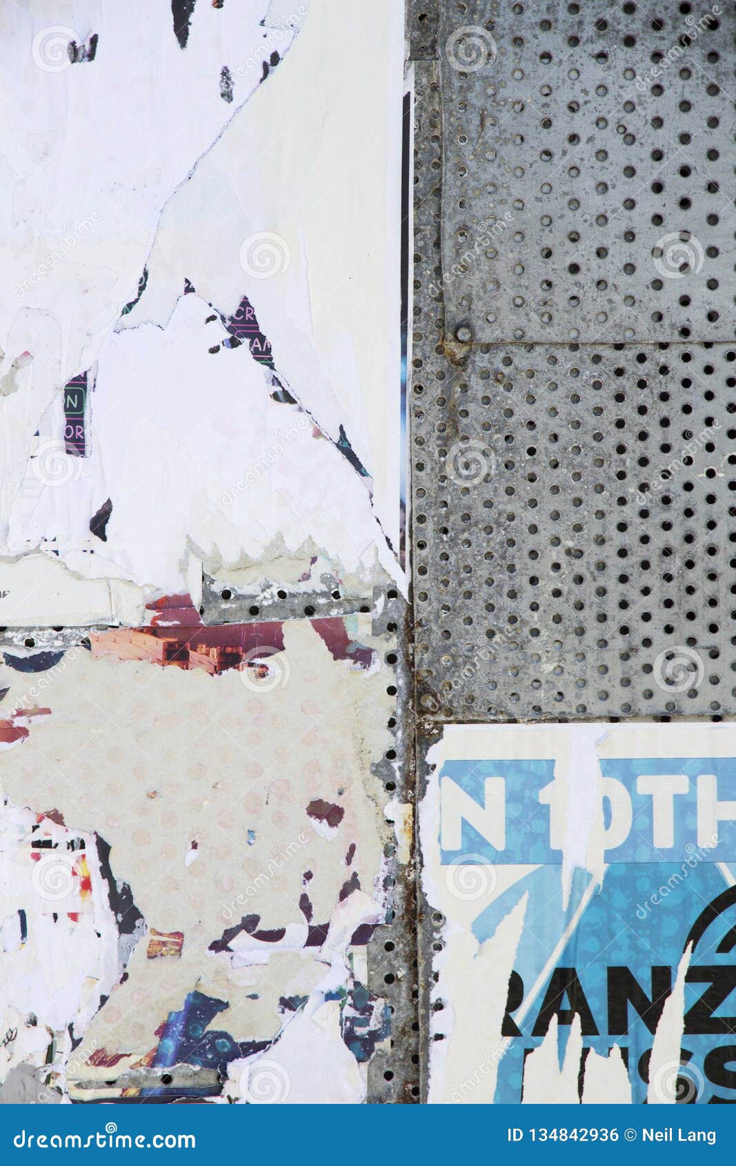 Torn posters on billboard stock photo. Image of backdrop - 134842936
