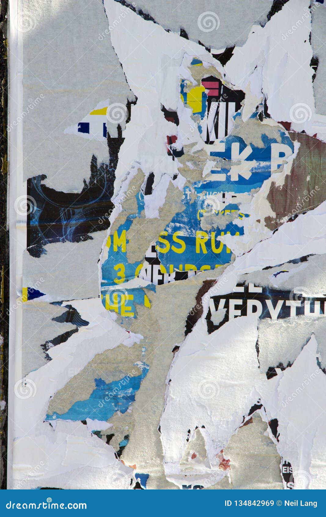 Torn posters on billboard stock image. Image of element - 134842969