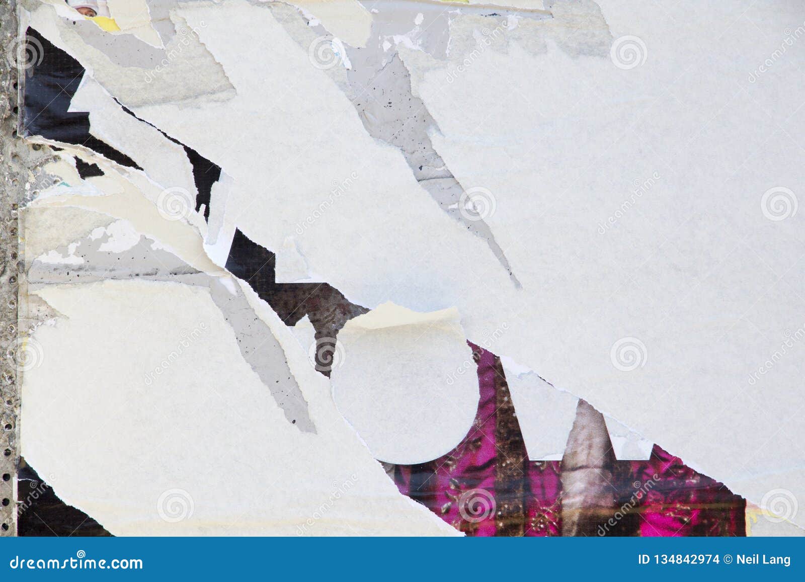 Torn posters on billboard stock photo. Image of faded - 134842974