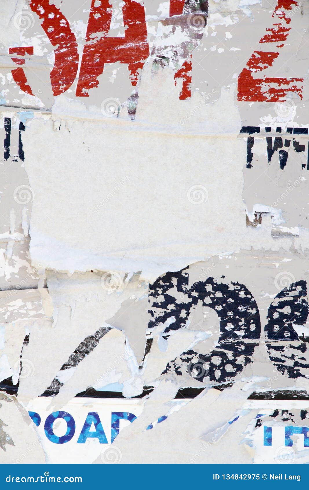 Torn posters on billboard stock image. Image of crease - 134842975