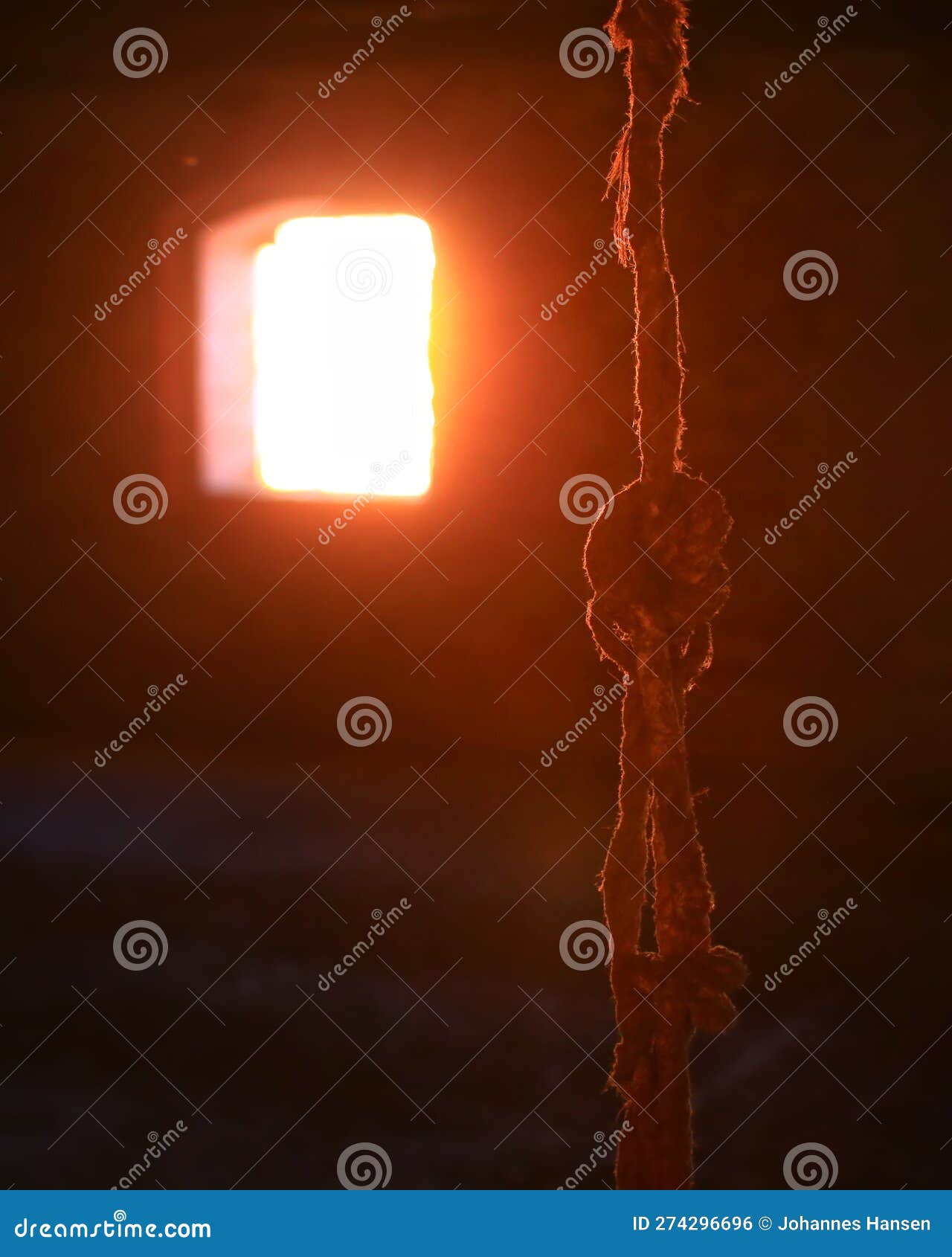 Torn Rope Hanging in Front of Bright Sunny Window Stock Photo - Image ...