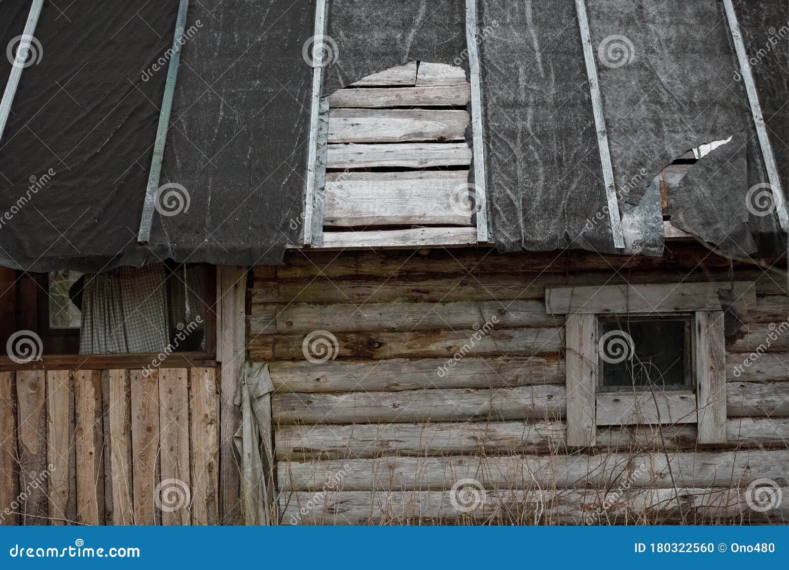 Torn Ruberoid Roofing Material on the Roof of the House Stock Photo ...
