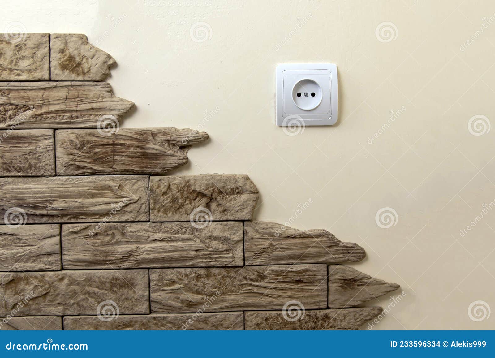 Torn Stone Wall Interior and Electrical Outlet on the Wall Stock Photo ...