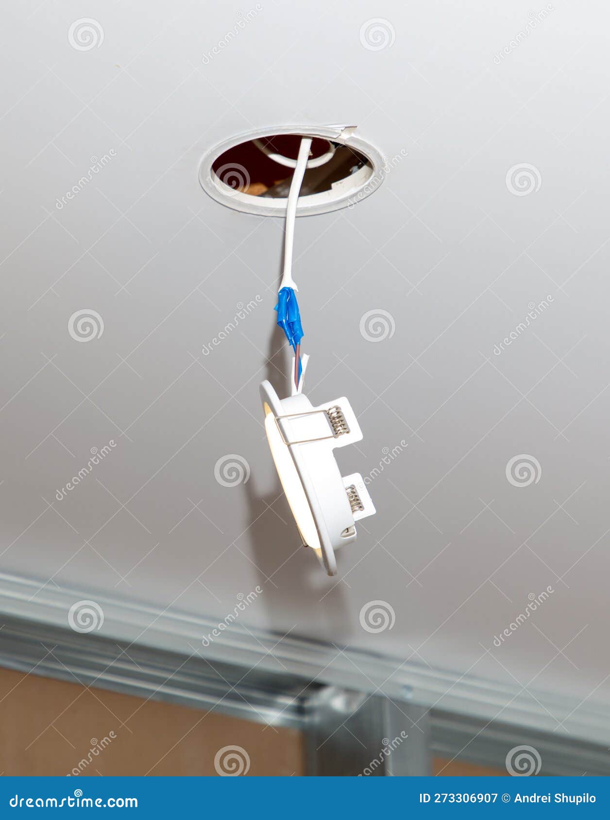 Torn Stretch Ceiling Near the Light Bulb Stock Image - Image of stretch ...