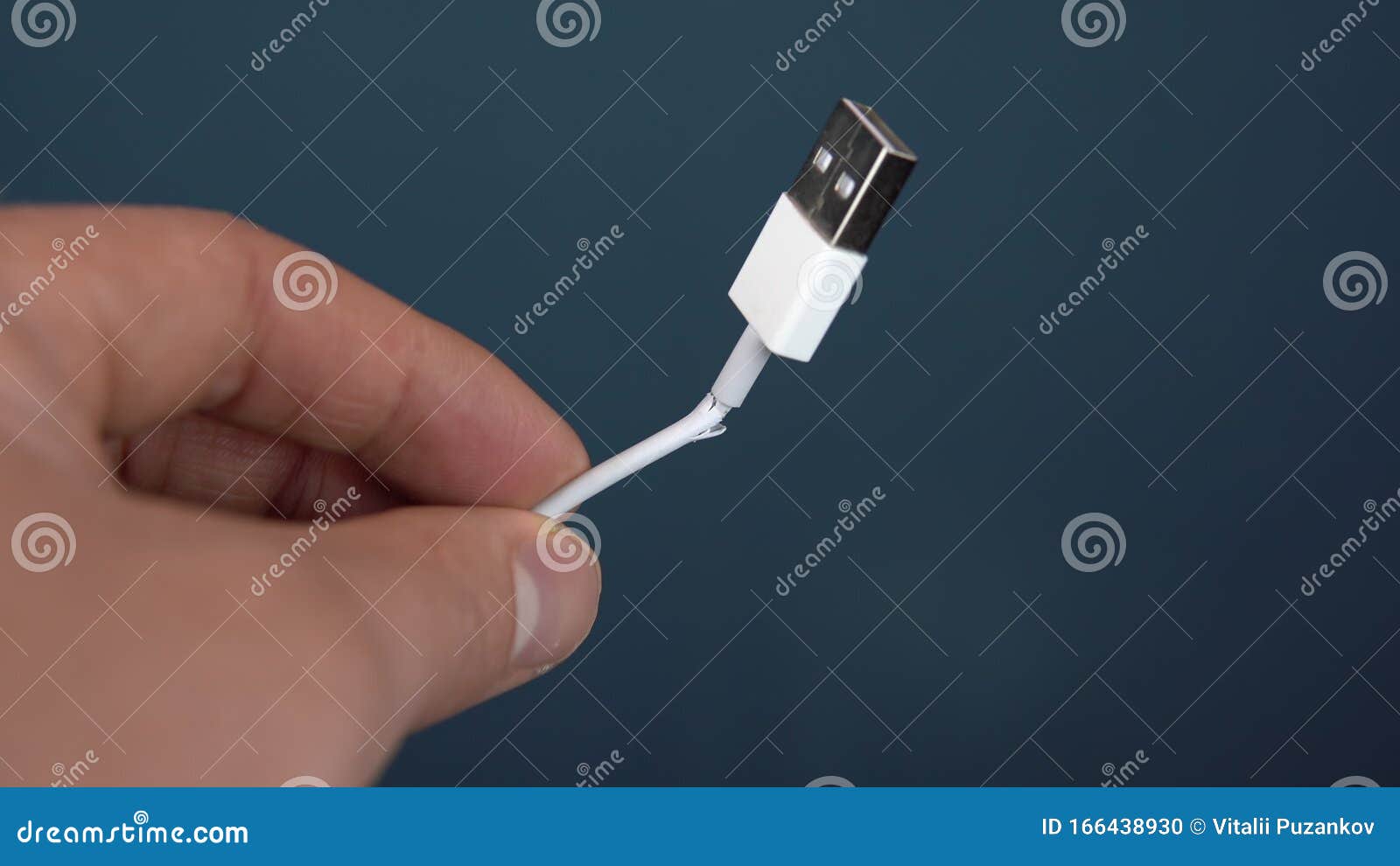 Torn USB Cable Close-up. a Man Holds a Torn Wire in His Hands Stock ...