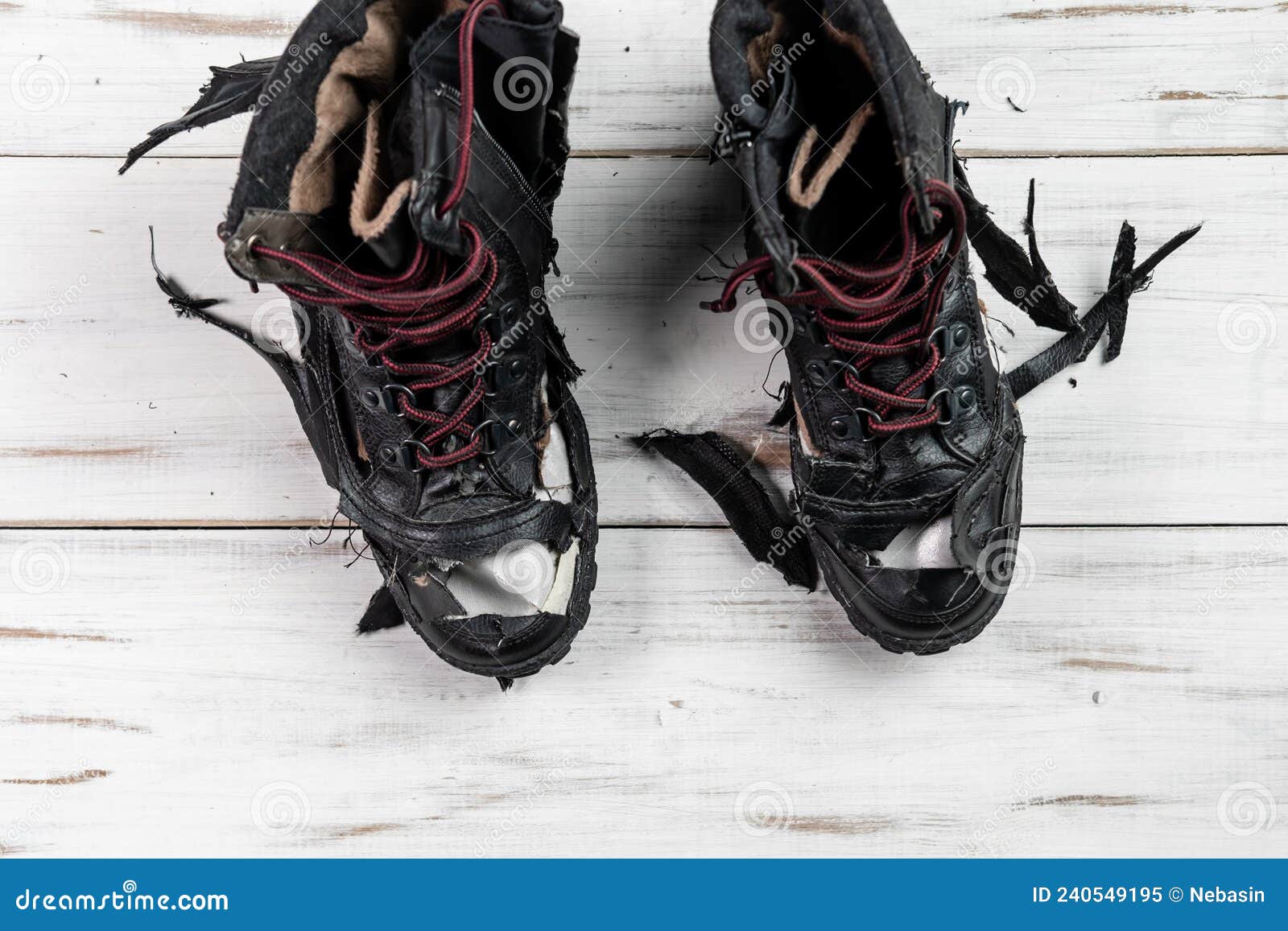 Torn Worn Shoes Boots. Light Wooden Background Stock Image - Image of ...