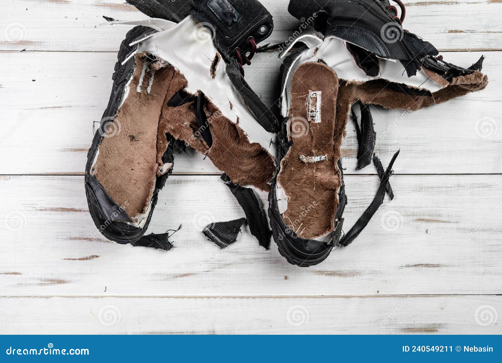 Torn Worn Shoes Boots. Light Wooden Background Stock Image - Image of ...
