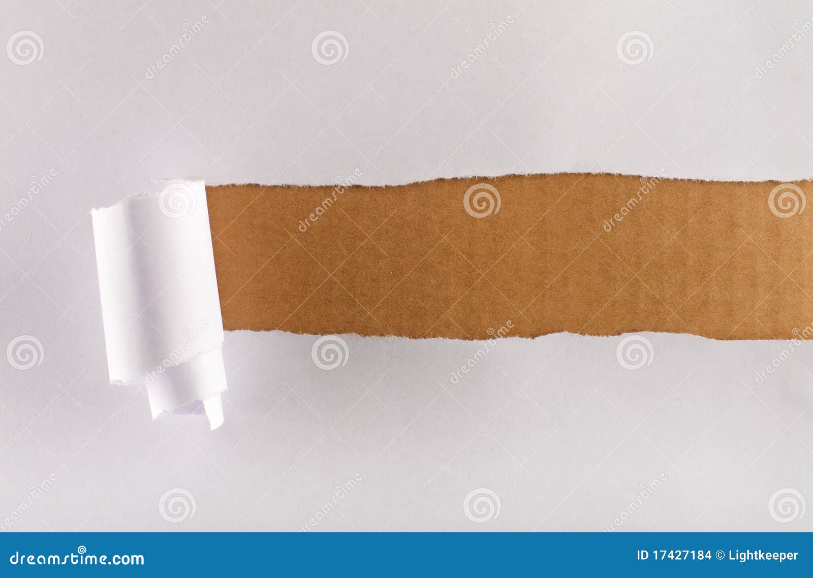 Torn Wrapping Paper Over Brown Cardboard Stock Photo - Image of ...