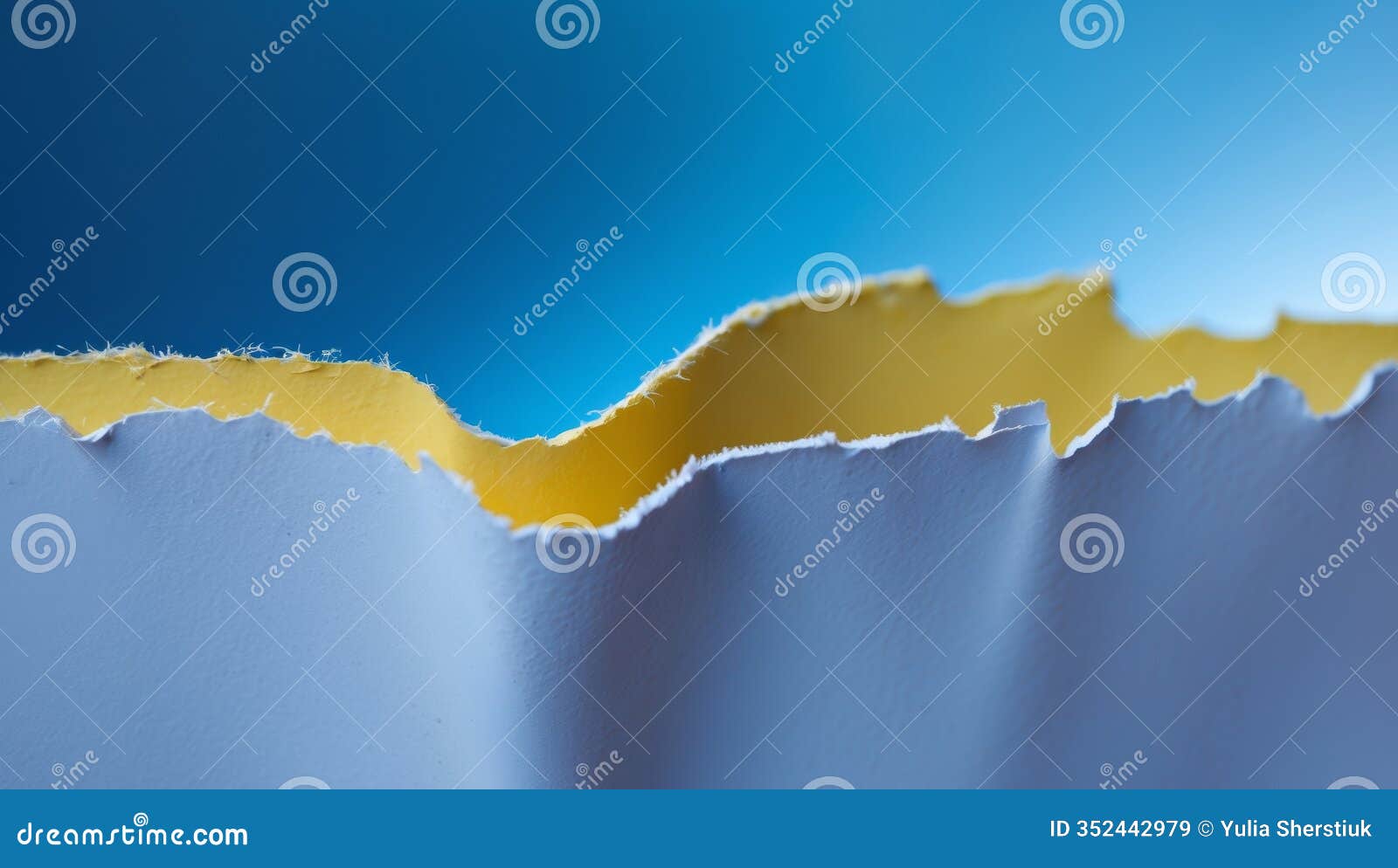 Torn Yellow Paper with Blue Background and Textured Cut Edge Stock ...