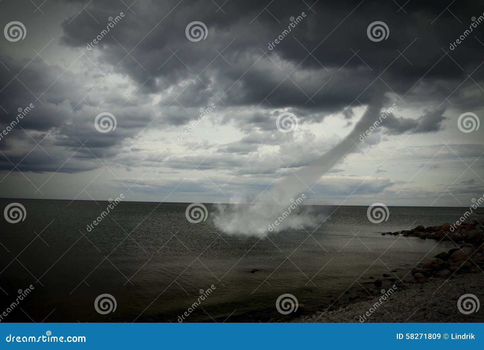 Tornado over the ocean stock image. Image of overcast - 58271809