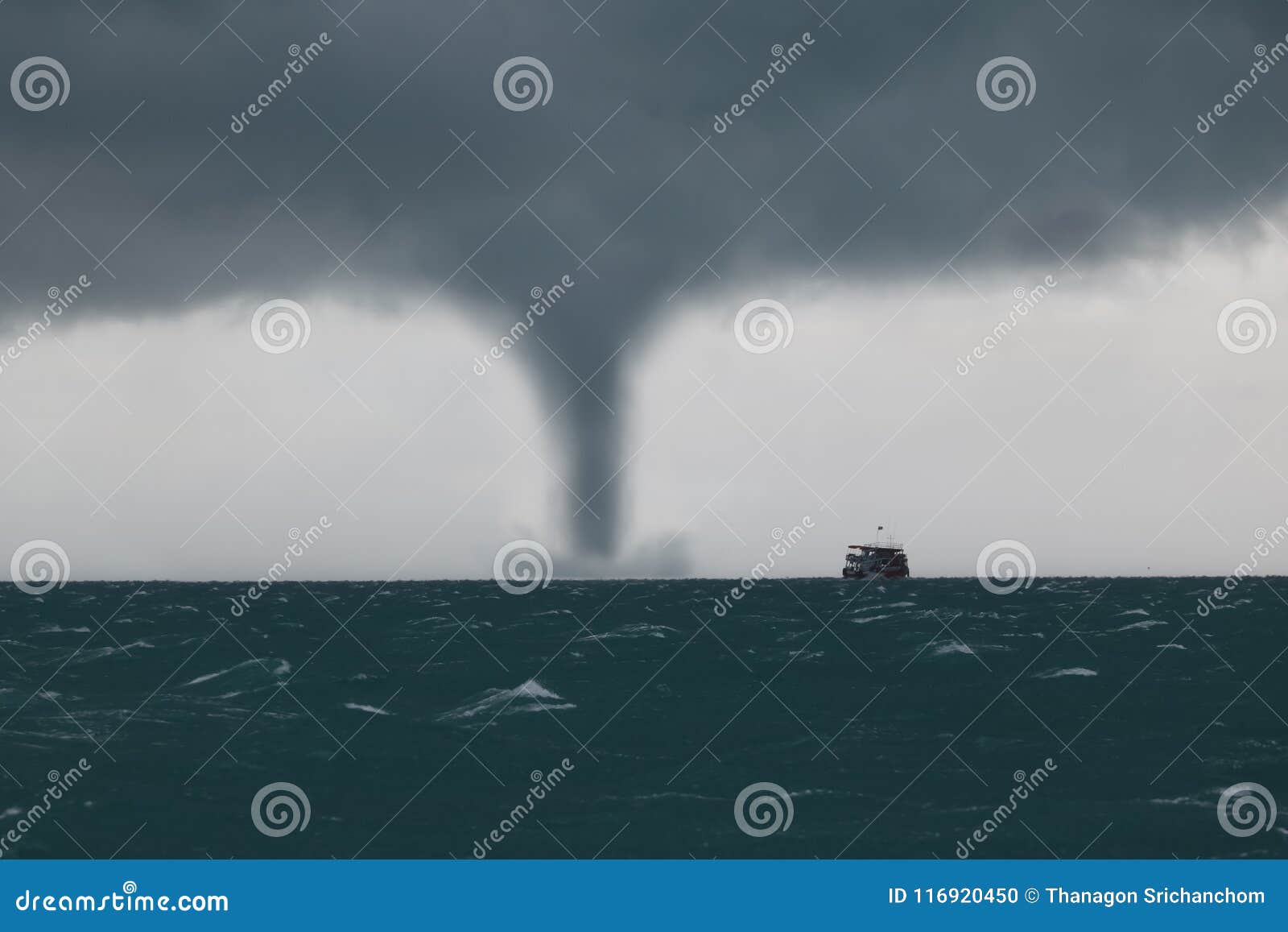Tornado And Storm Cloud In The Sea While The Ship Is Sailing. Royalty ...