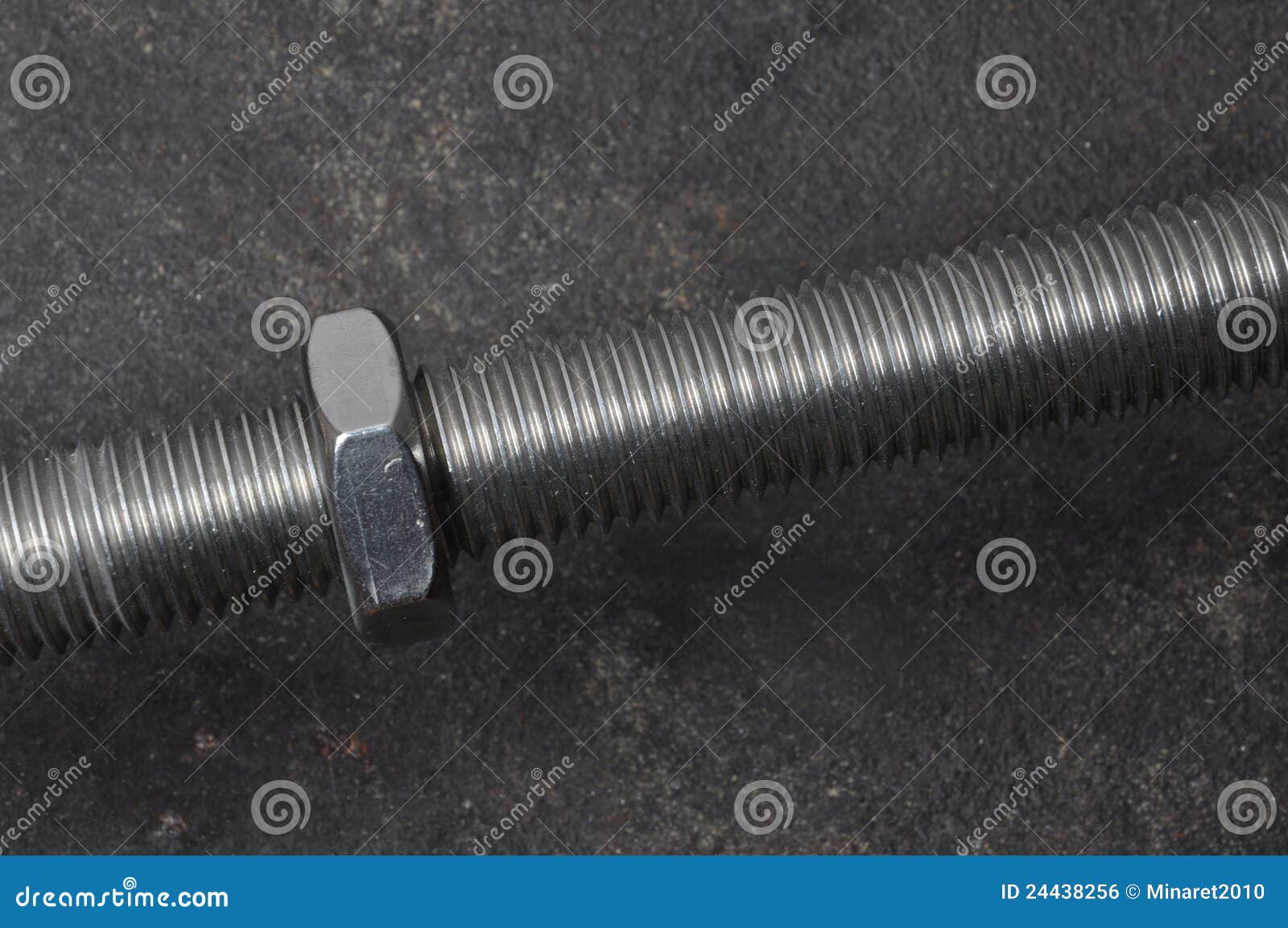 Tornillo Roscado Con Una Tuerca Foto de archivo - Imagen de extracto ...