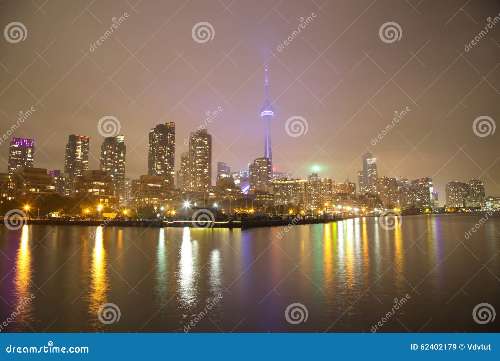 Toronto Skyline at Night with a Reflection in Lake Ontario Stock Image ...