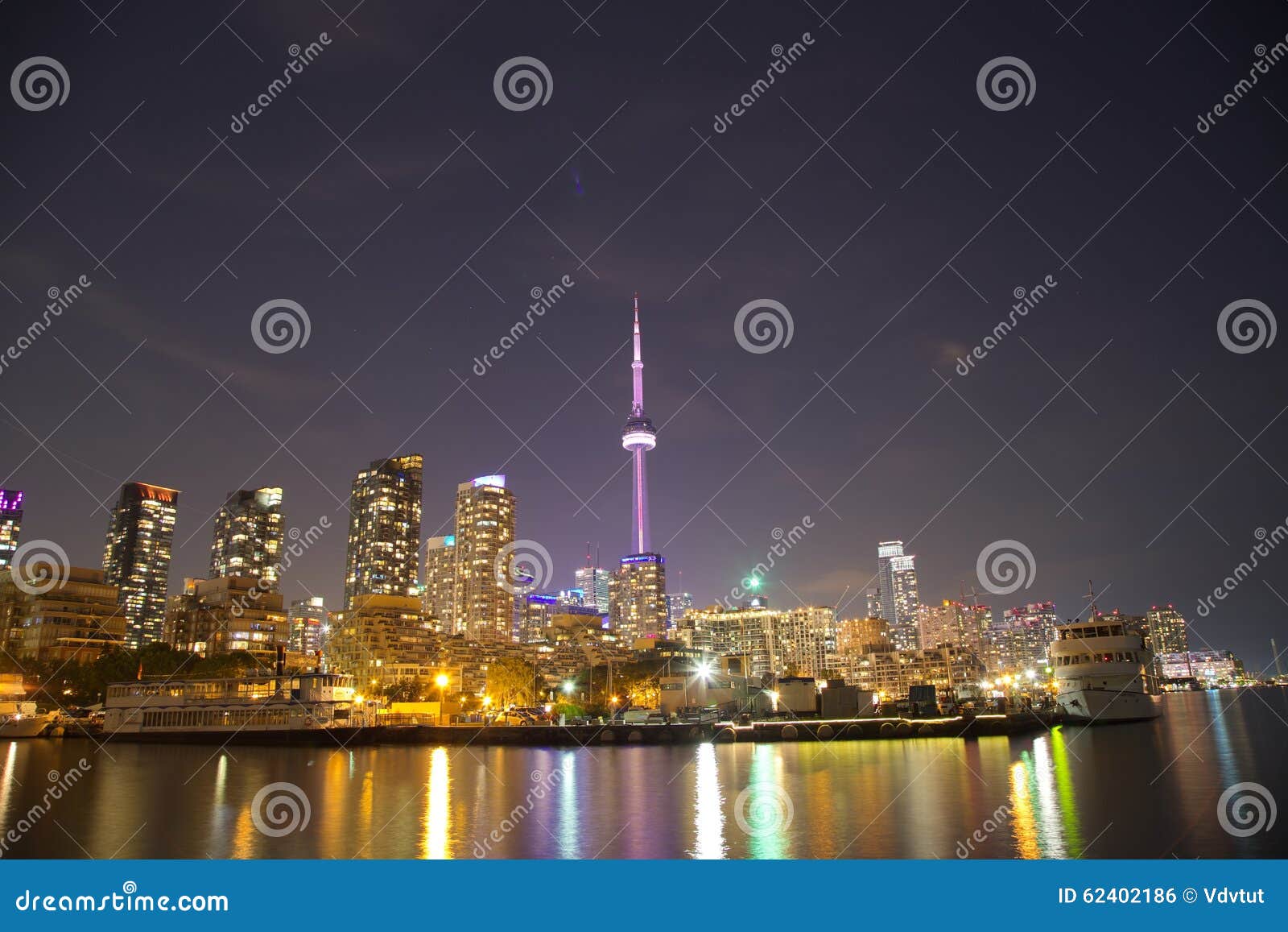 Toronto Skyline at Night with a Reflection in Lake Ontario Stock Photo ...