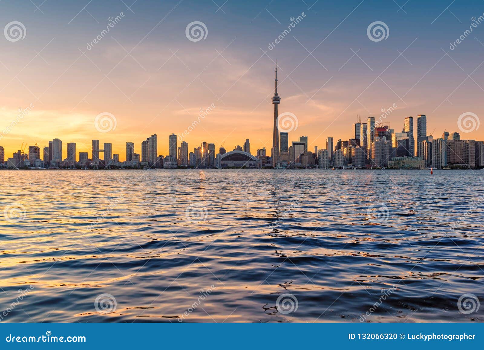 Toronto skyline at sunset stock photo. Image of landmark - 132066320