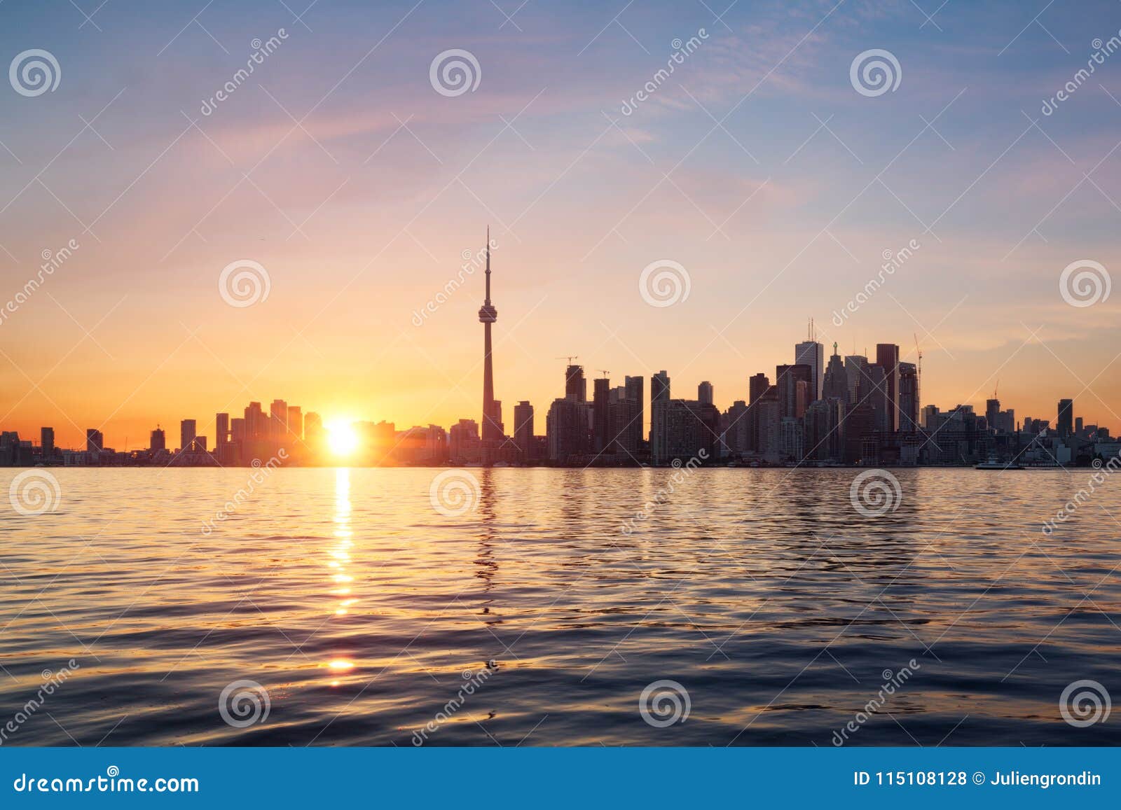 Toronto skyline at sunset stock photo. Image of ontario - 115108128