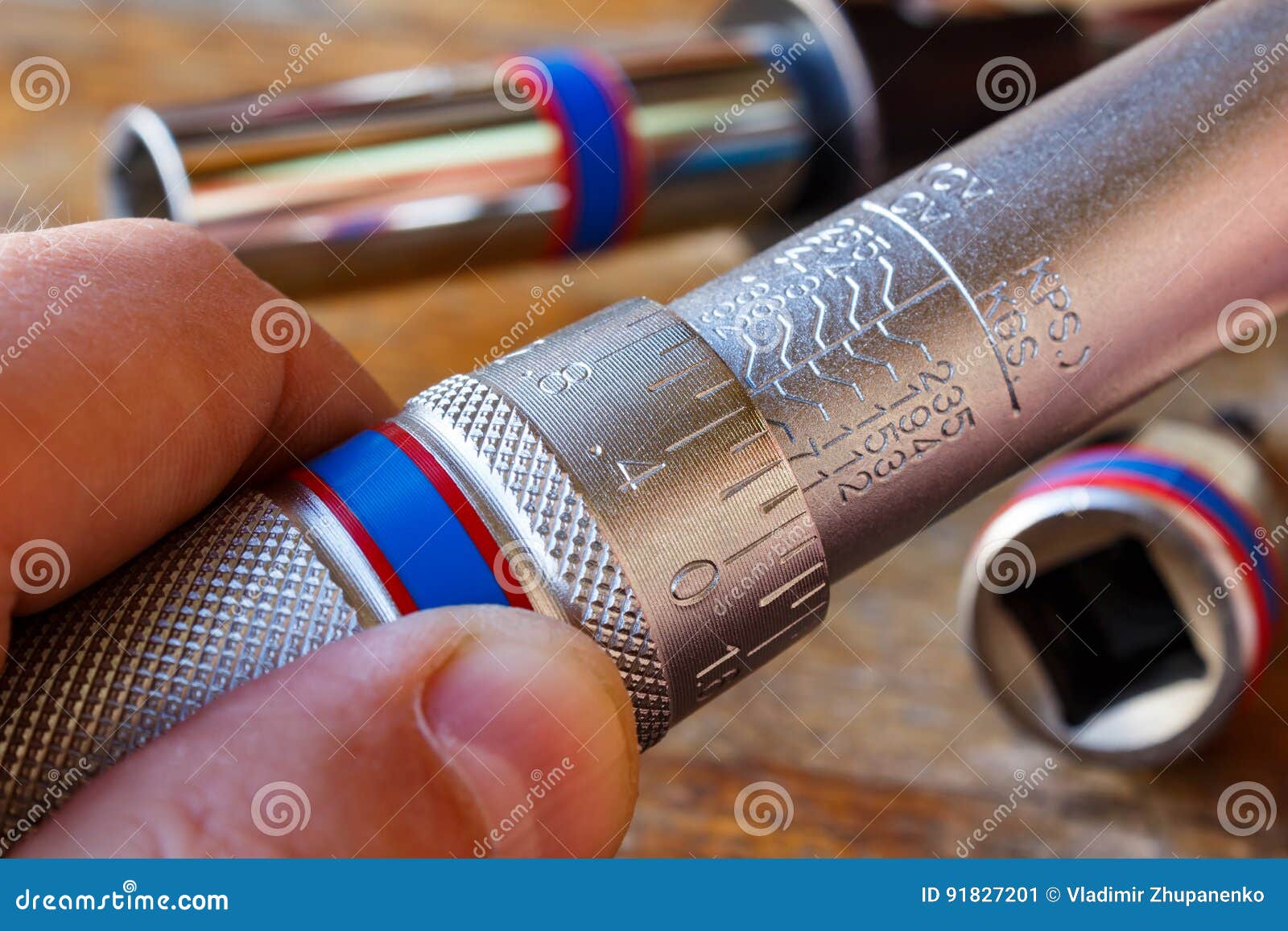 Torque Wrench Adjusting by Mechanic in the Workshop Stock Image - Image ...