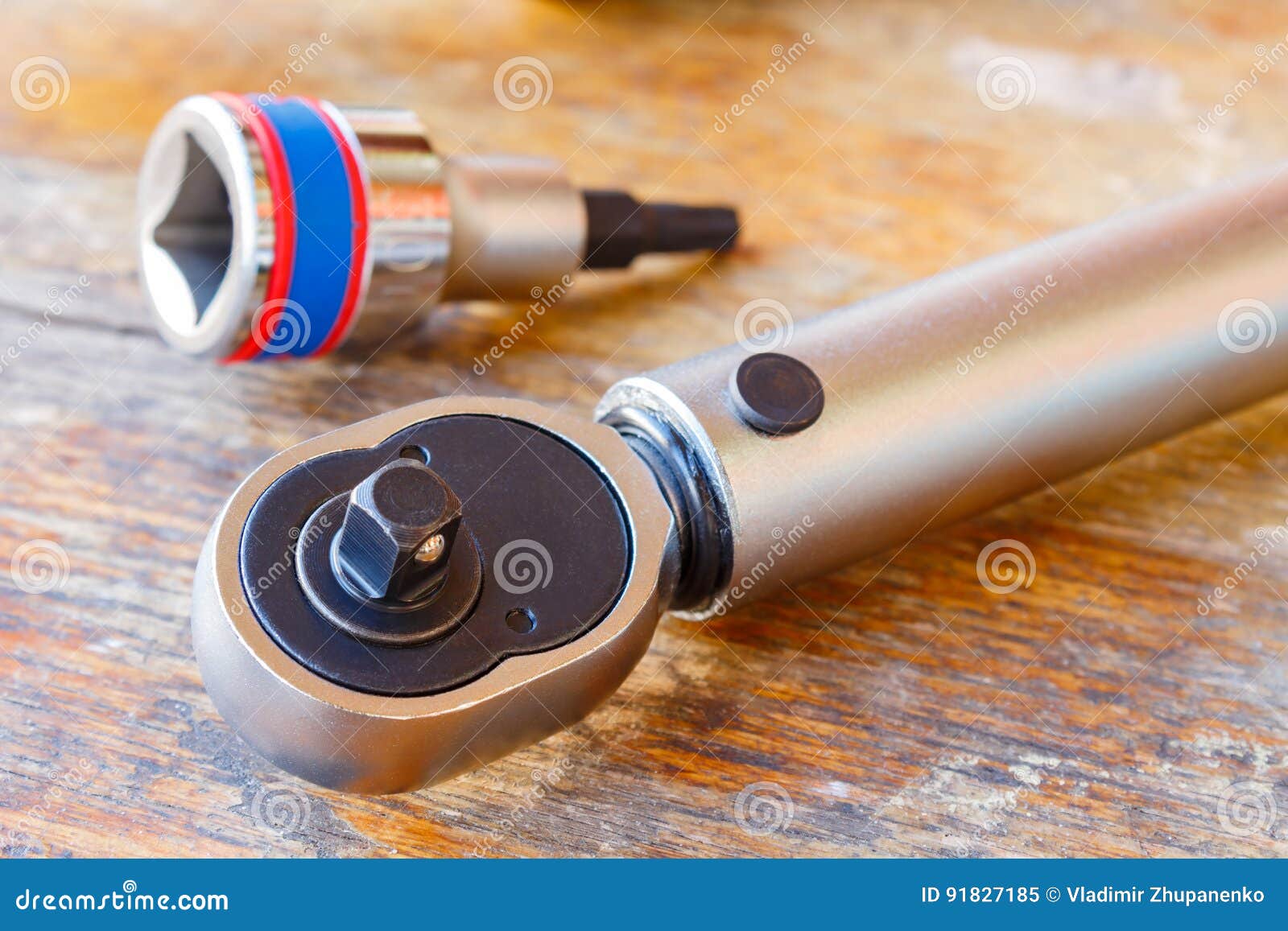 Torque Wrench and Spanner Head on a Wooden Table in the Workshop Stock ...