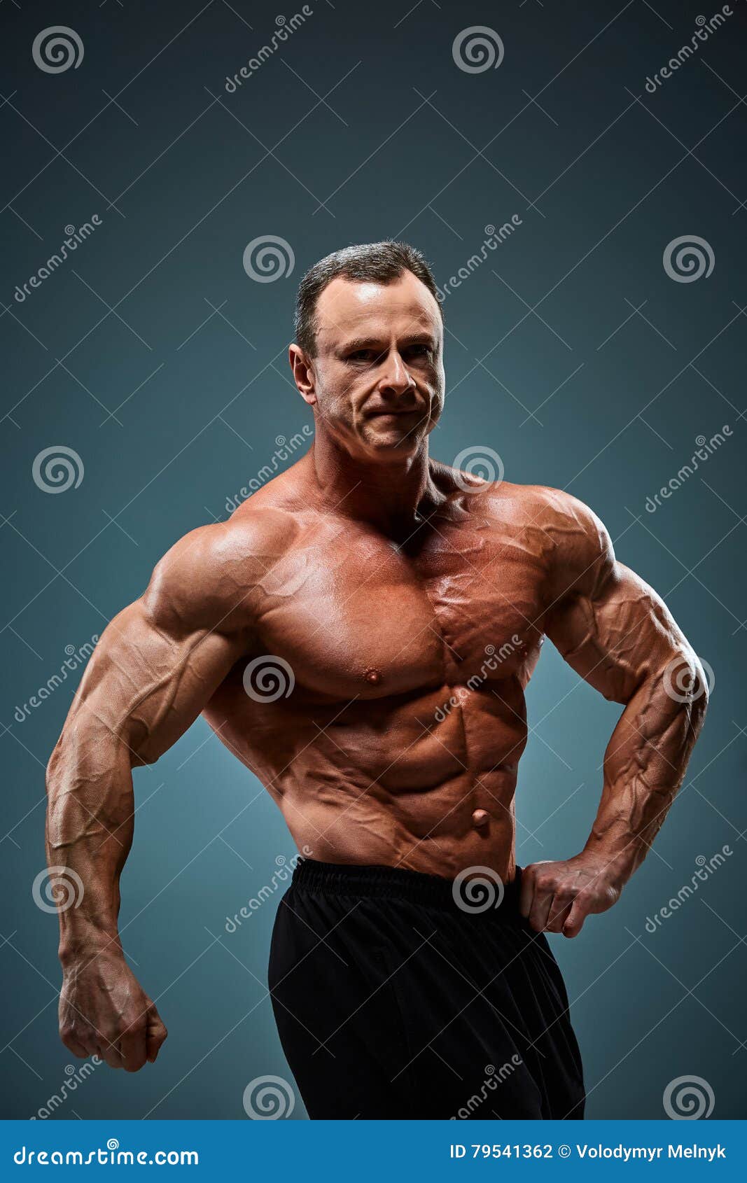 Torso of Attractive Male Body Builder on Gray Background. Stock Photo ...