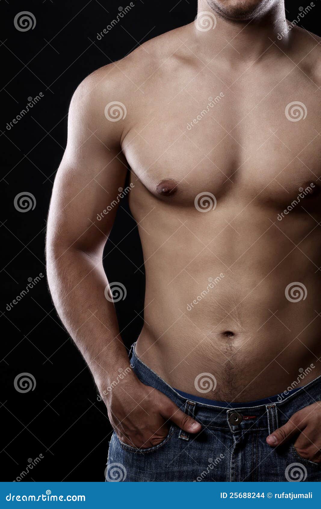 Torso Muscular Del Hombre Joven Foto de archivo - Imagen de vaqueros ...