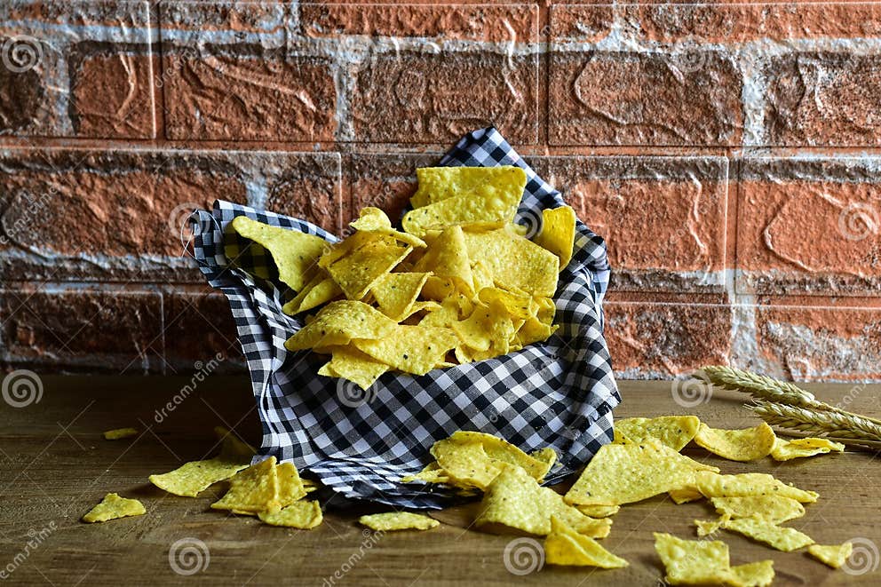 Tortilla Chips are a Snack Made from Corn that is Cut into Triangles ...