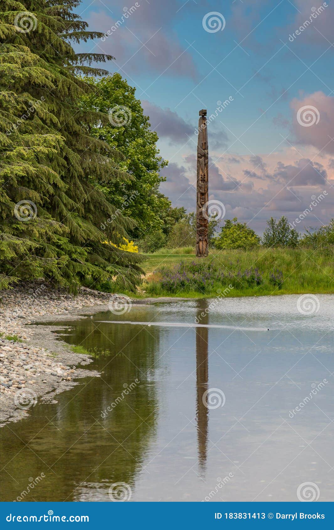 Totem Pole and Reflection at Dusk Stock Image - Image of ritual ...