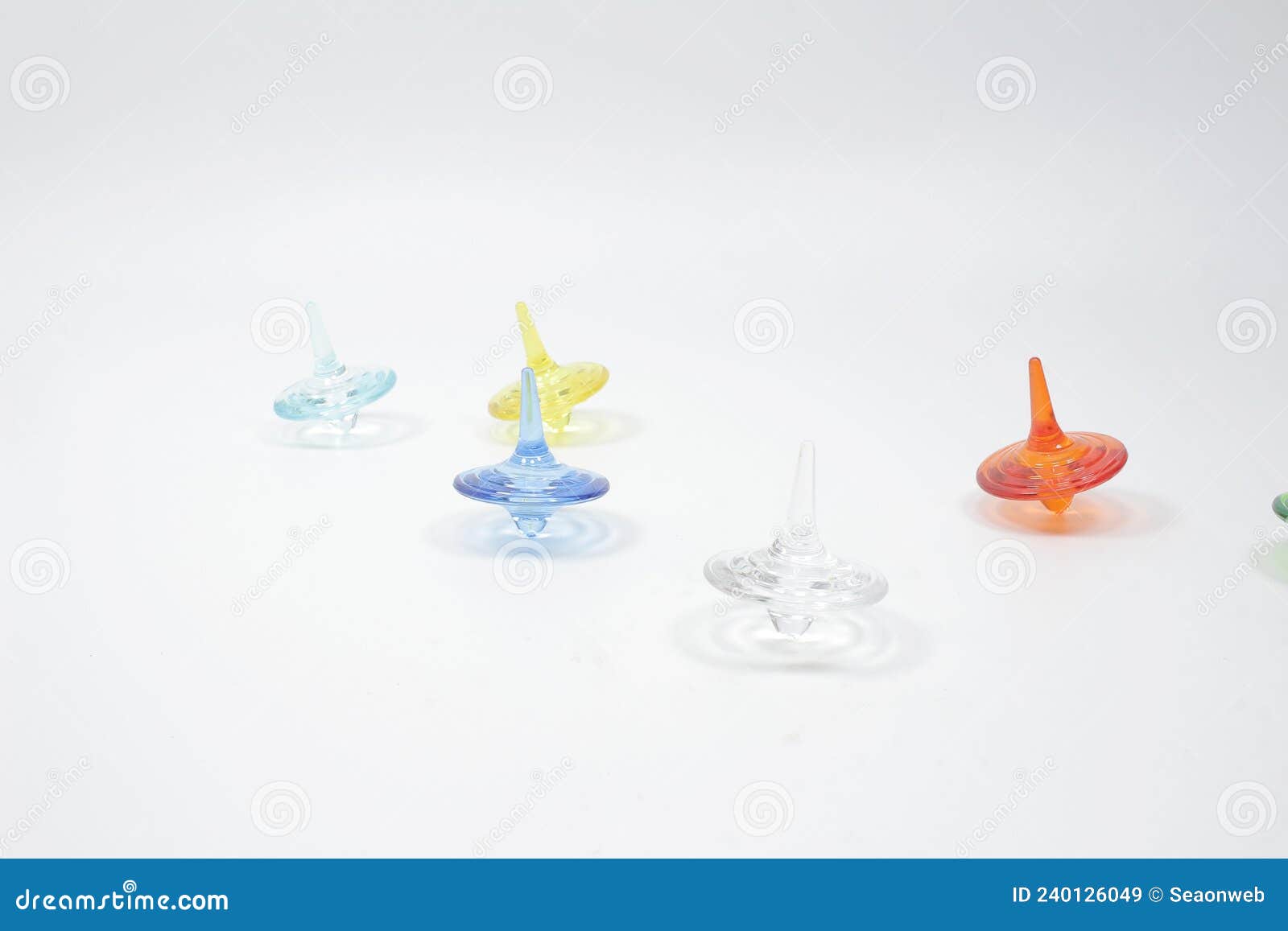 A Totem Spinning Tops Spinning, Wobbling and Stopping Stock Image ...