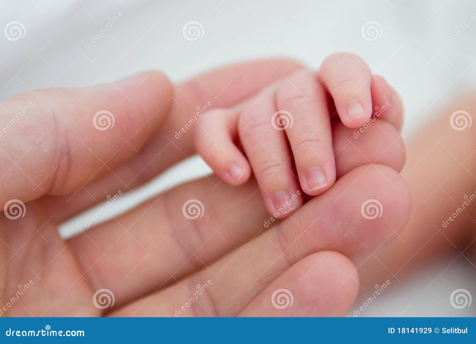 Touch of newborn s hand stock image. Image of newborn - 18141929