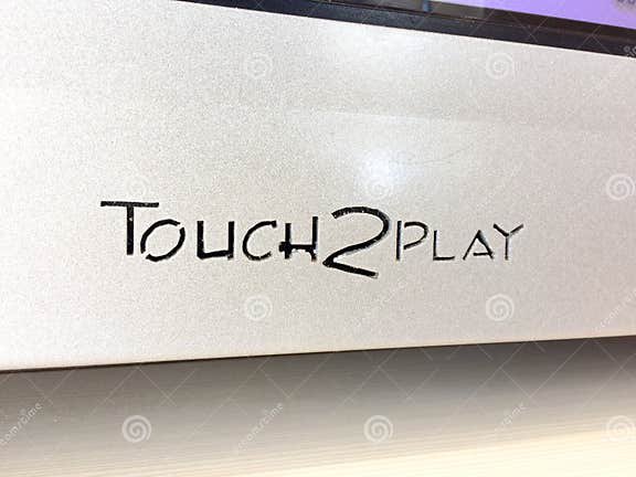 Touch 2 Play Logo on Touchscreen Editorial Image - Image of business ...