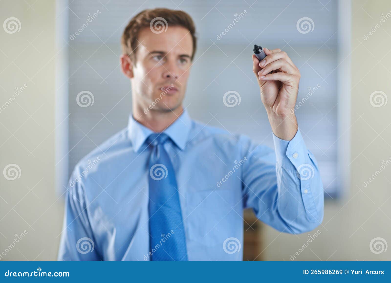 Touching the Future. a Handsome Young Businessman Using a Digital ...