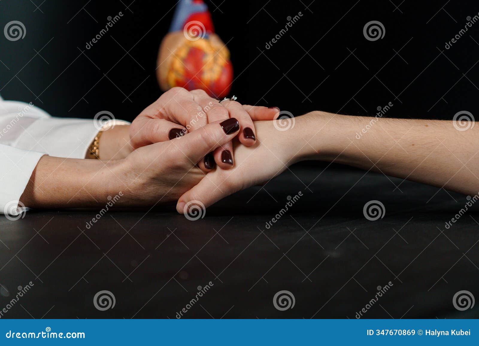 Touching Moment of Connection with Heart Model in Background Stock ...