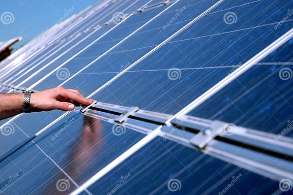 Touching a solar panel stock photo. Image of blue, environment - 10675678