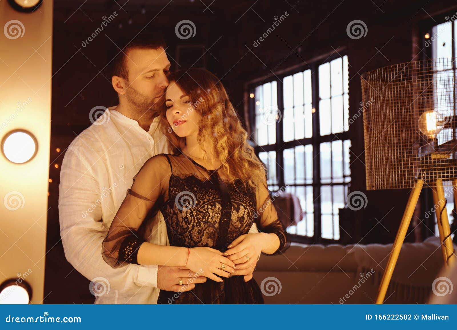 Portrait of a Couple in the Mirror Stock Photo - Image of lamp, house ...