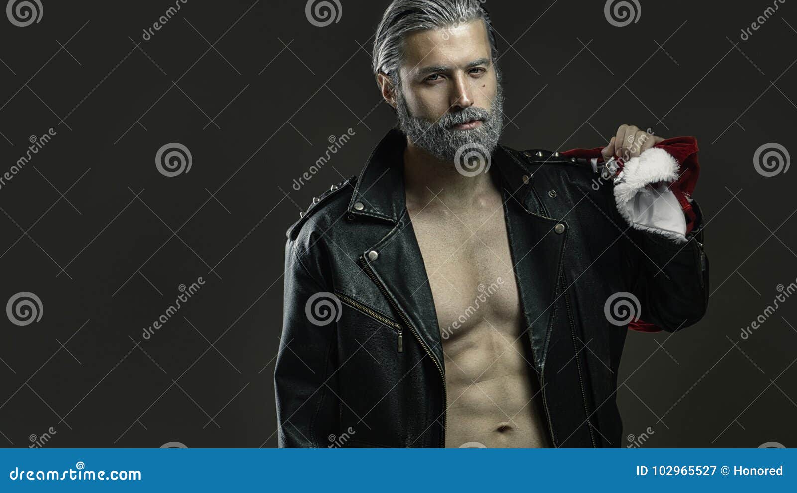 Tough santa claus stock image. Image of adult, rocker - 102965527