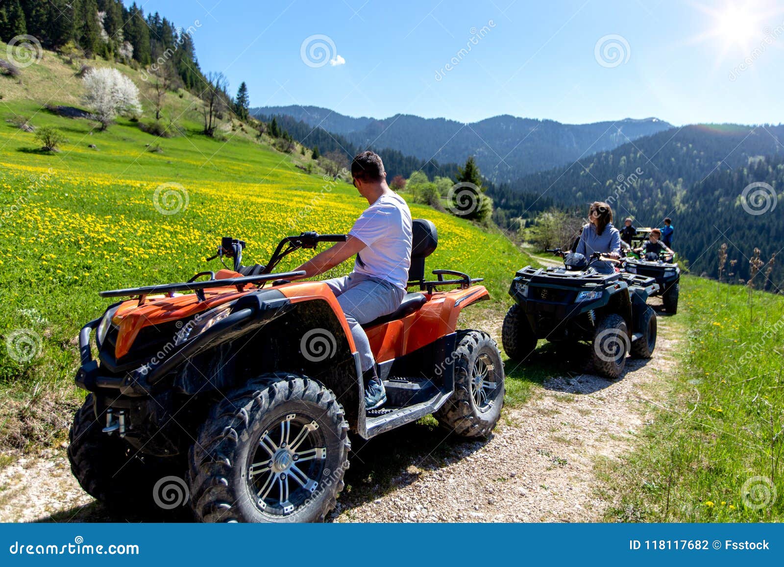 A Tour Group Travels on ATVs and UTVs on the Mountains Stock Photo ...