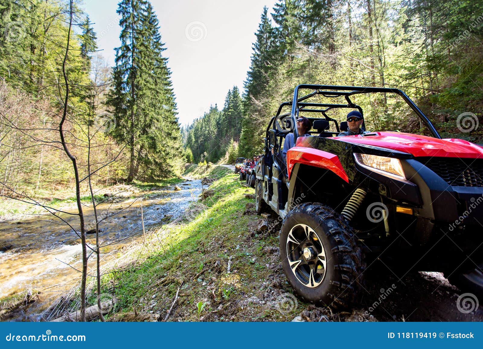 A Tour Group Travels on ATVs and UTVs on the Mountains Stock Image ...