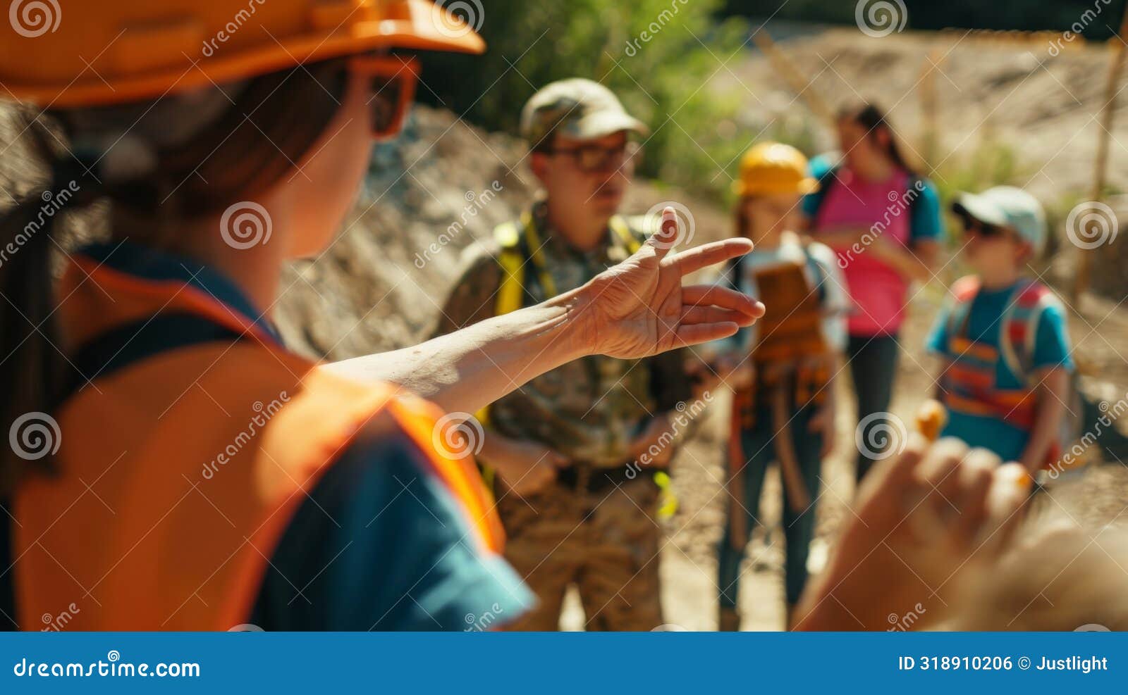A Tour Guide Pointing Out Different Types of Building Materials To the ...