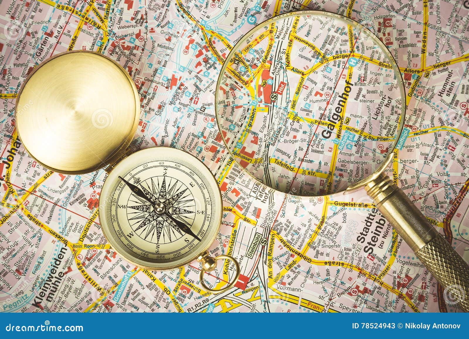 Tourism Concept. Magnifying Glass with Compass on City Map Stock Image ...
