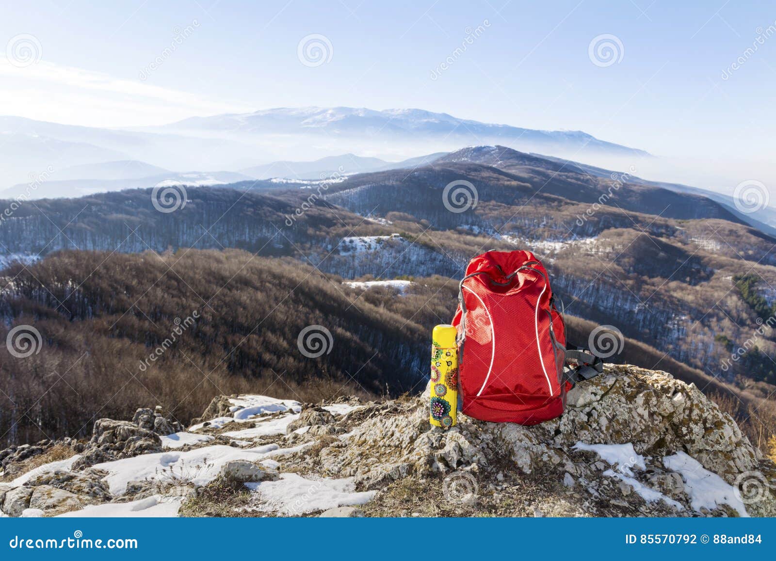 Tourist Backpack in Mountains Landscape Under Blue Sky Stock Photo ...
