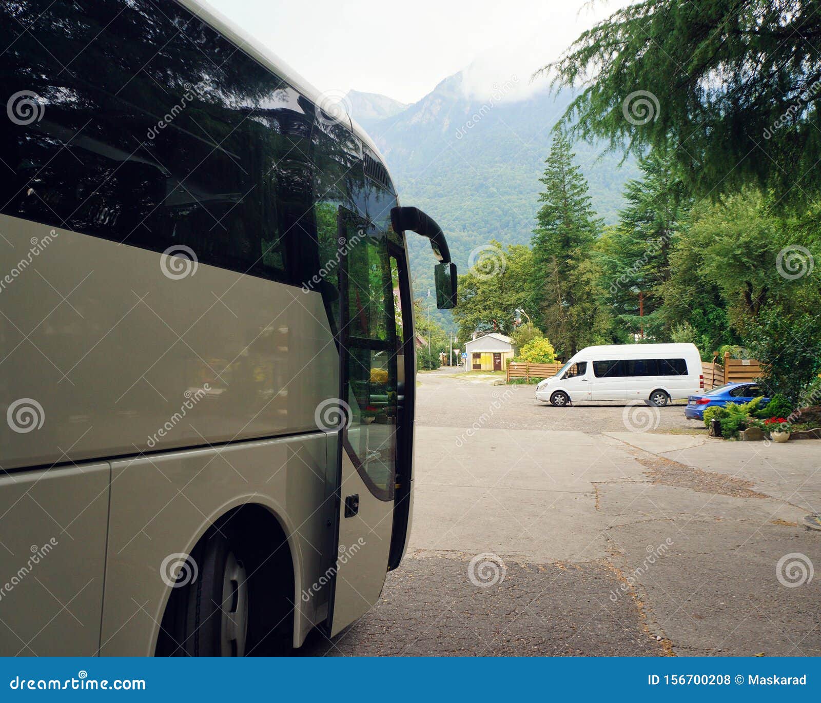 Tourist Bus in the Mountains Stock Photo - Image of road, entertainment ...