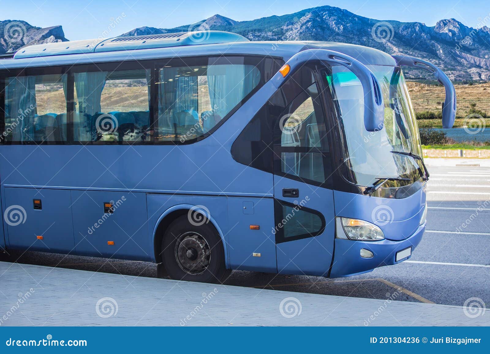 Tourist Bus at the Stop in Front of the Mountain Landscape Stock Photo ...