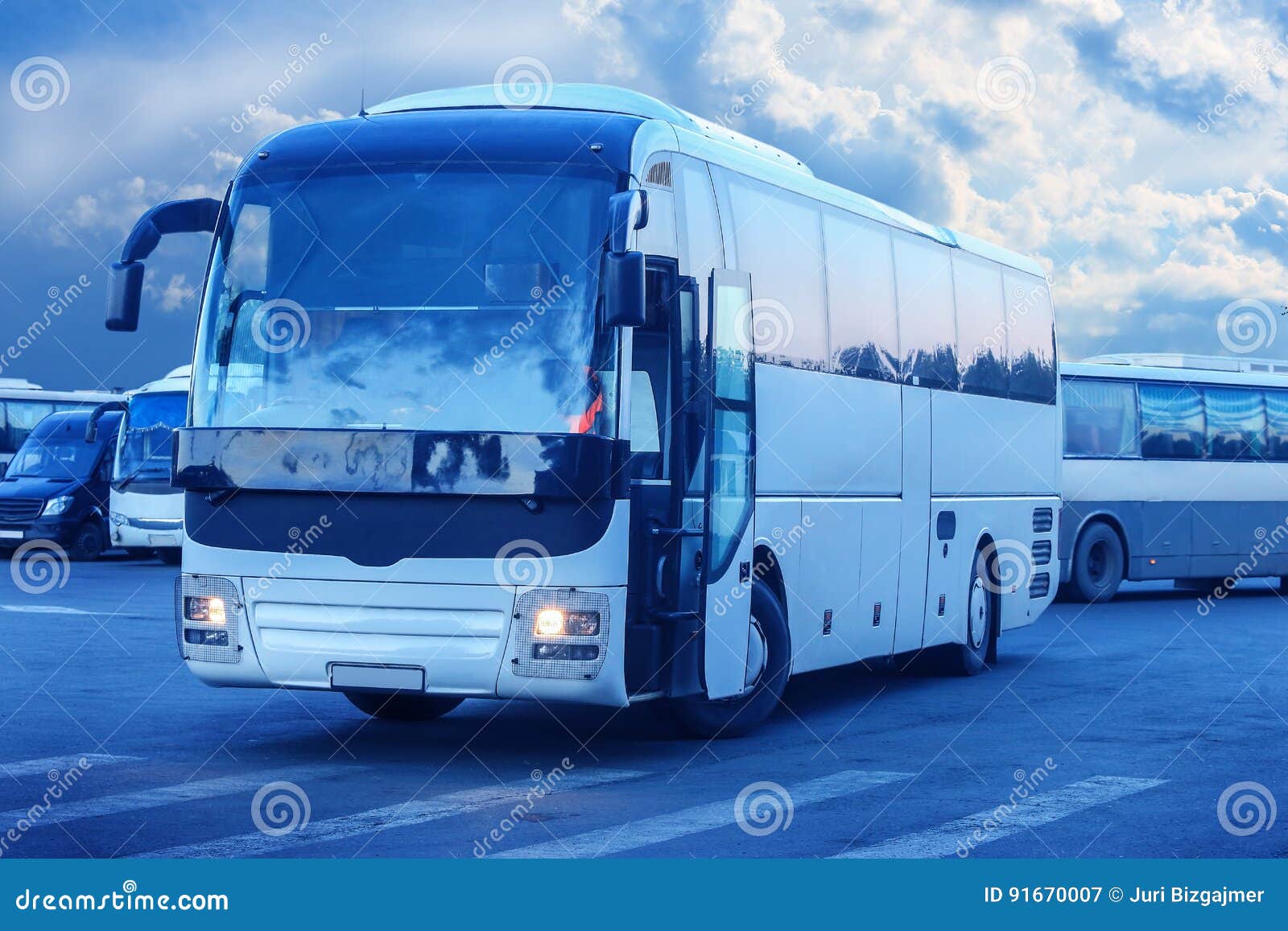 Tourist buses on parking stock image. Image of blue, city - 91670007