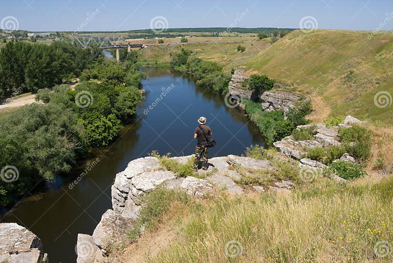 Tourist on a Cliff Above the River Stock Image - Image of break, rocks ...